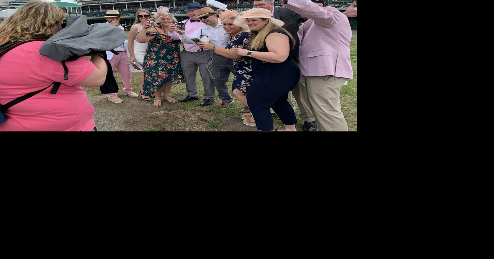 Infield crowd takes weather in stride to keep the party going for ...