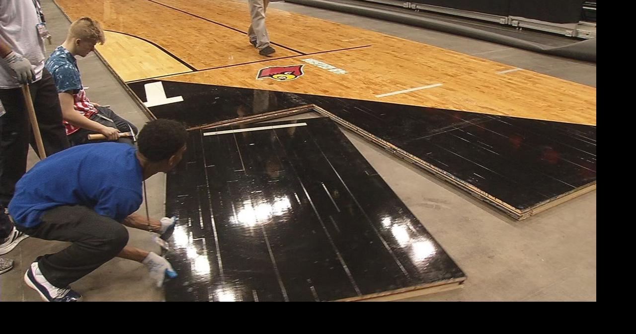 IMAGES | NCAA floor installed at KFC Yum! Center | Sports | wdrb.com