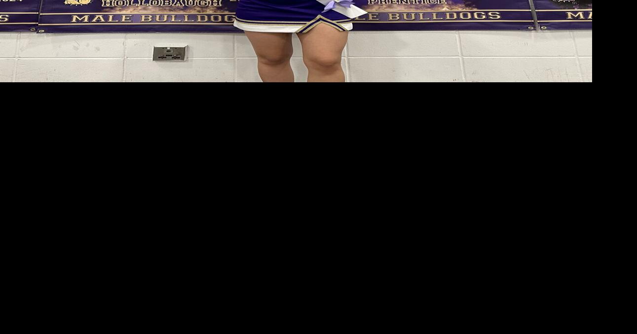 Addison Colvin with cheerleading poster.JPEG | | wdrb.com