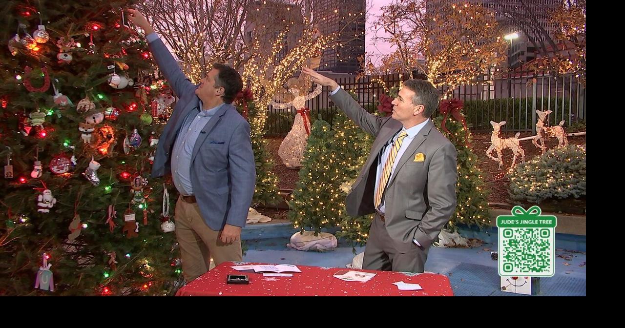 Keith Kaiser gets his first chance to hang ornaments on the Jingle Tree ...