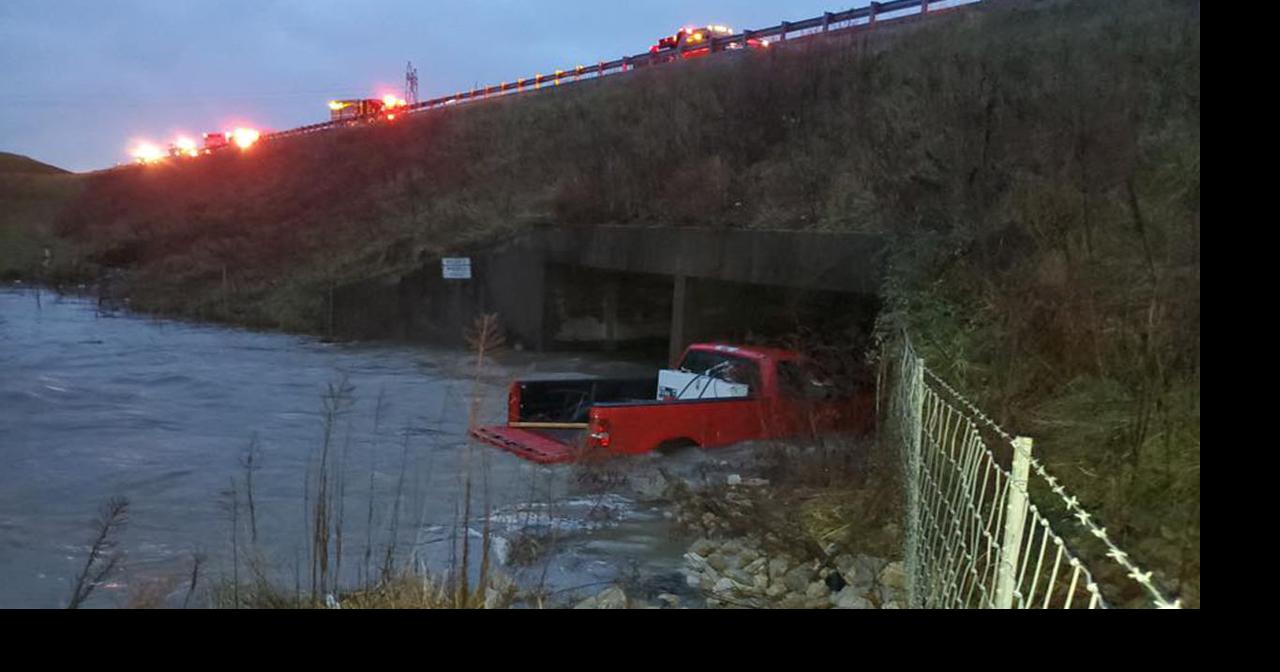 1 man, 3 children rescued from pickup truck in flooded Elizabethtown ...