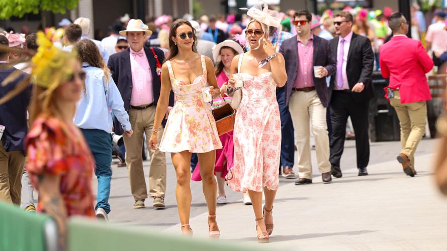 Kentucky Oaks crowd dodges storms for a day of racing, fashion at ...