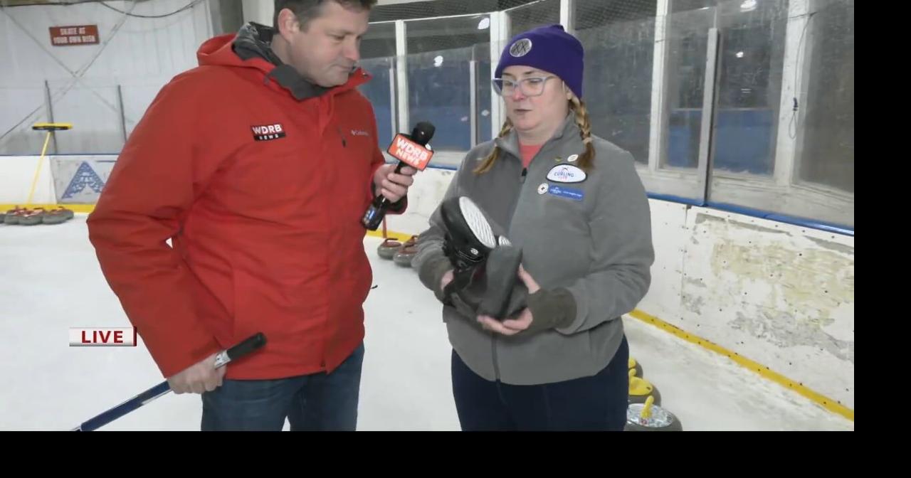Keith Kaiser learns the equipment used in curling | | wdrb.com