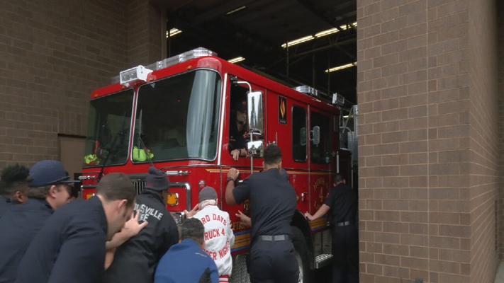 Louisville firefighters celebrate new firetruck with traditional push ...
