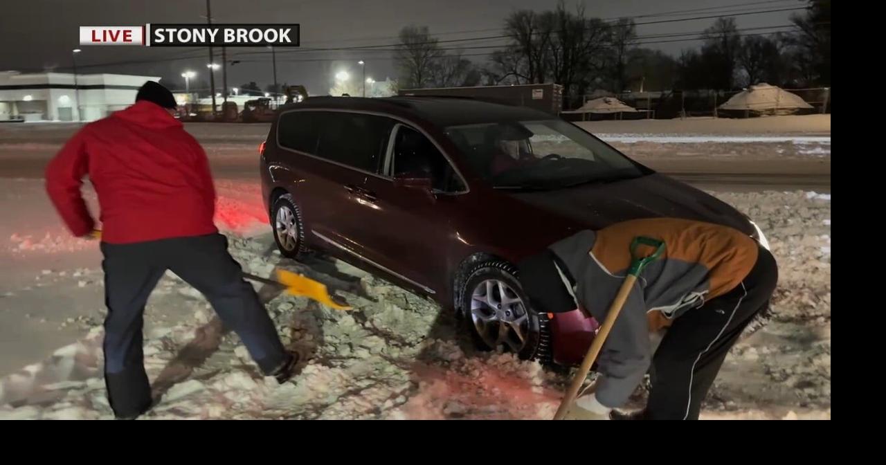 Keith Kaiser lends a helping hand to a stranded motorist in east ...