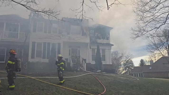 Firefighter taken to hospital after falling through floor during ...