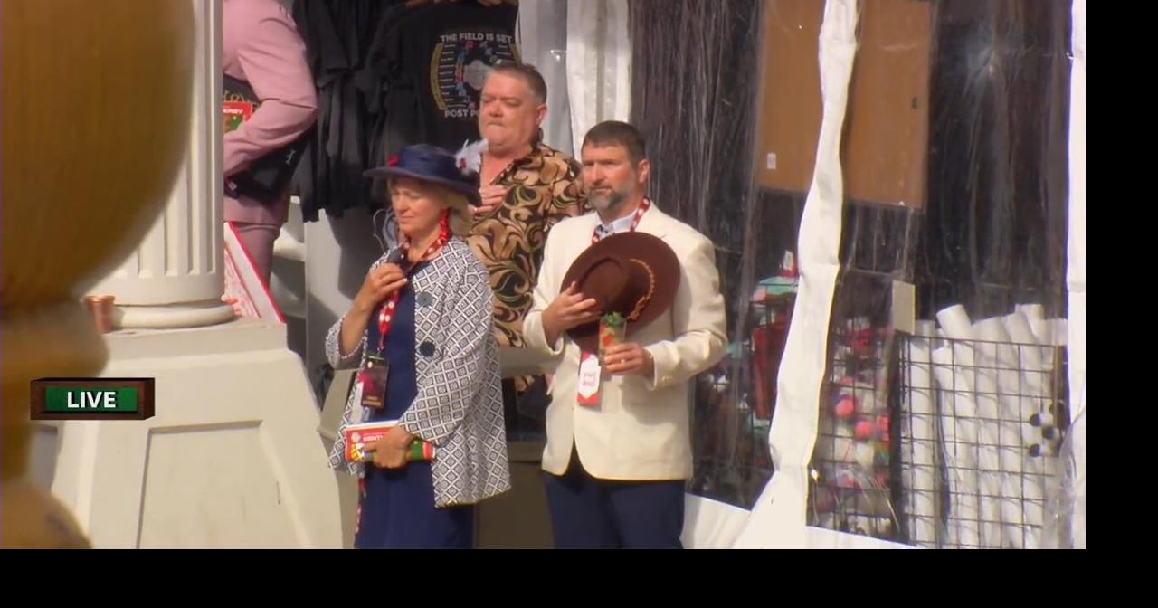 Derby crowds stand at attention at Churchill downs for National Anthem ...