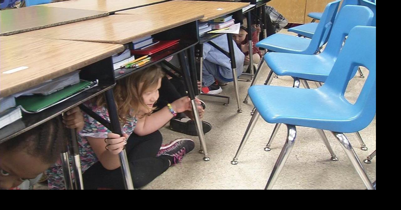 Drop, cover and hold on! Louisville students participate in earthquake ...