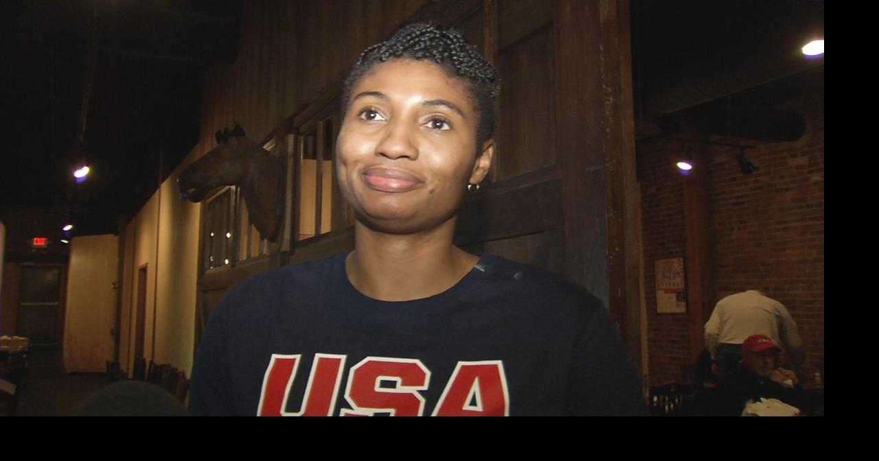 Former Louisville women's basketball star Angel McCoughtry greets fans ...