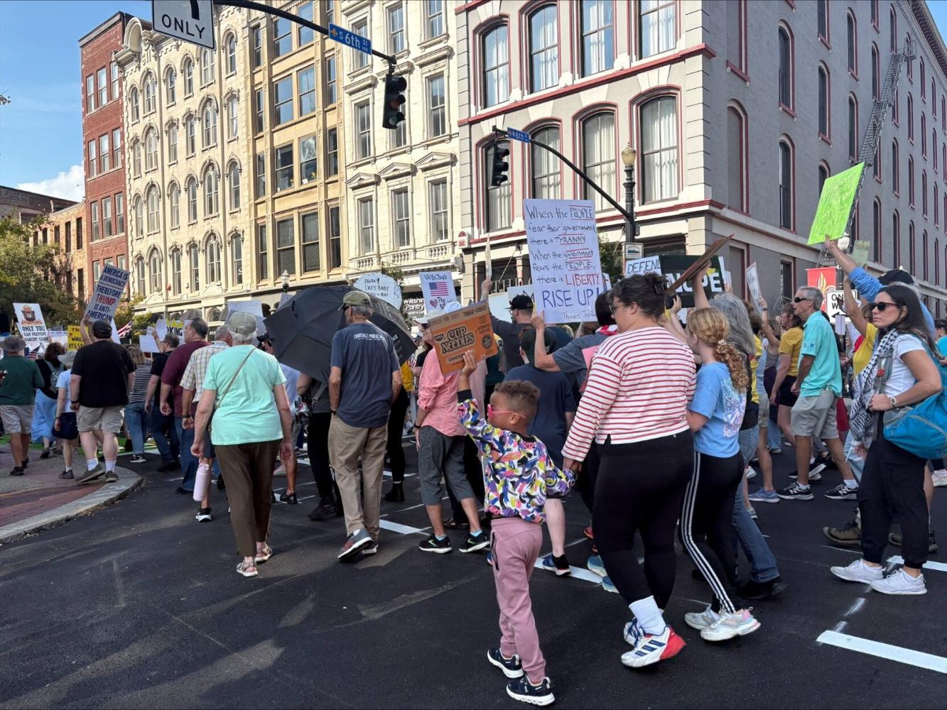 Thousands march in downtown Louisville against President Trump in 'No ...