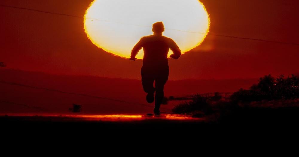 Sun beams on man running in Germany | | wdrb.com