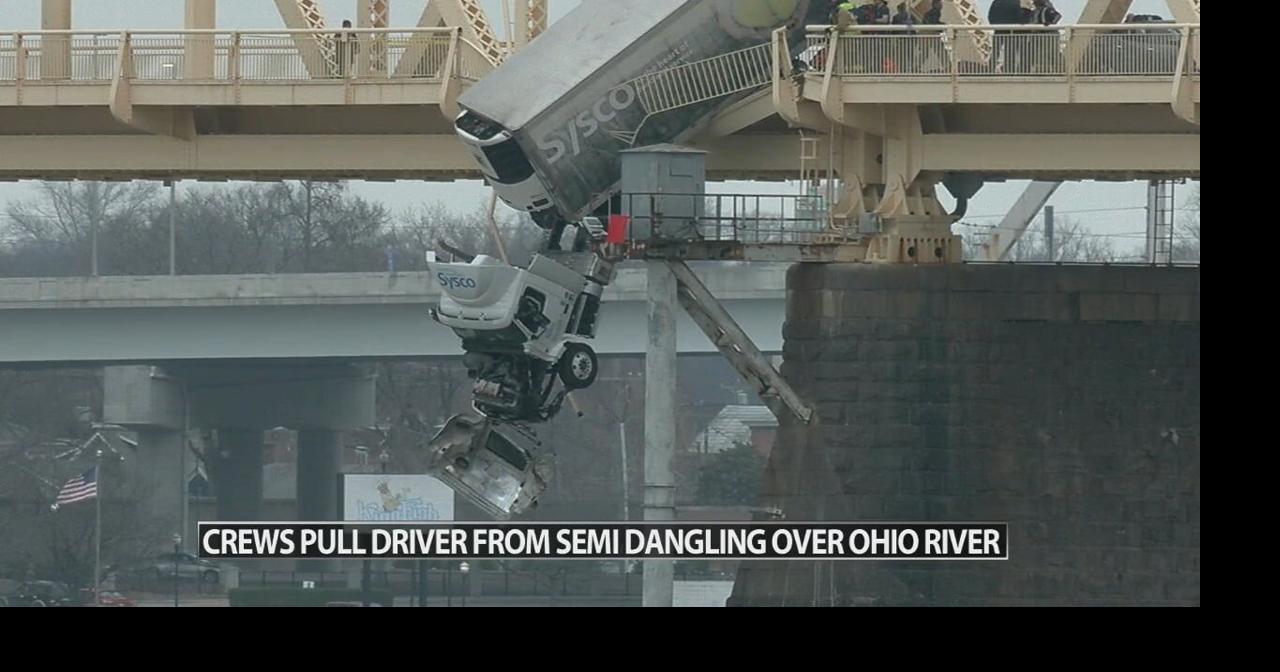 City officials talk about rescue of driver from semitruck hanging over ...