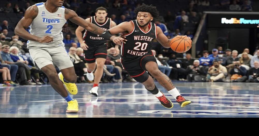 Jalen Duren defends Western Kentucky's Dayvion McKnight in the first ...