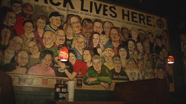 Meet the artist behind The Back Door's mural of loyal customers | Local ...