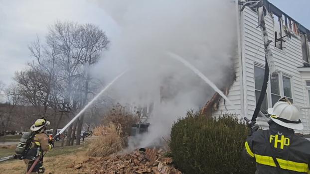 Firefighter taken to hospital after falling through floor during ...