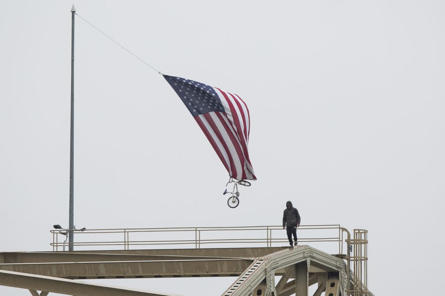 Climber scales Sellar Bridge, ties bike to US flag | Local News ...