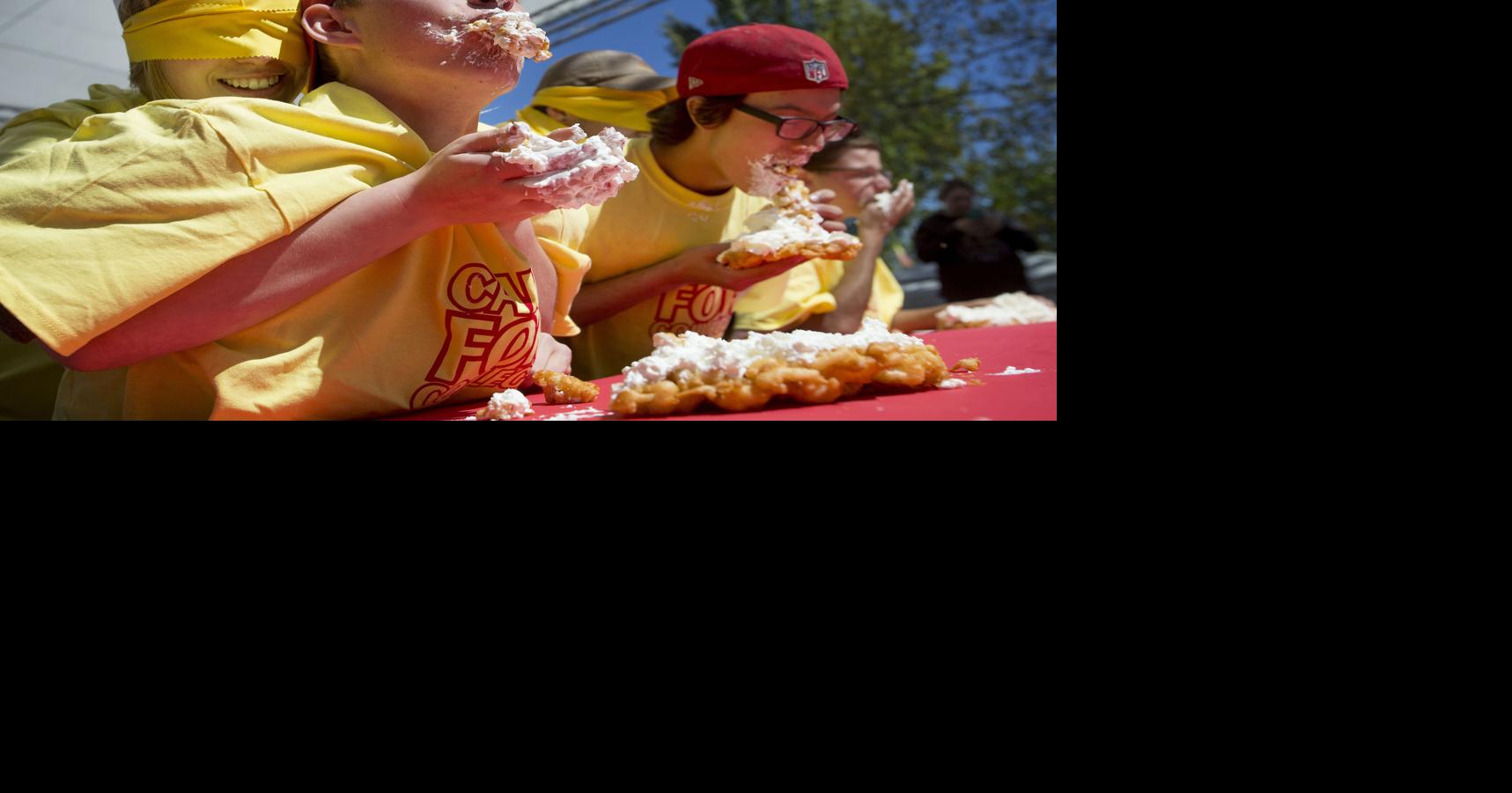 Festival's first Funnel Cake Eating Contest a delightfully messy ...