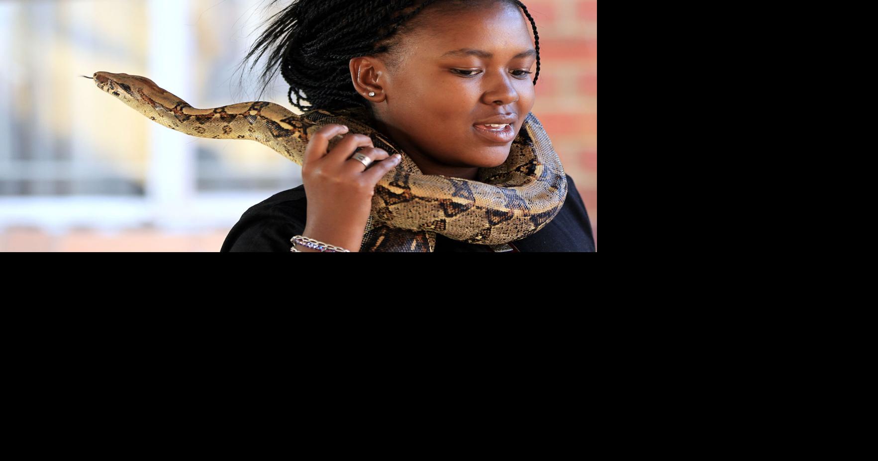 South Africa: Soweto resident shows off her snakes | World ...