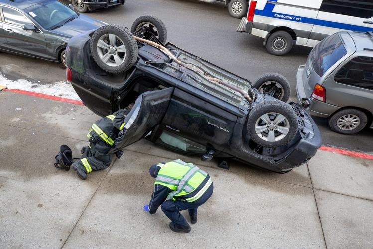 Photos: Accident leaves one car on the sidewalk | Local News ...