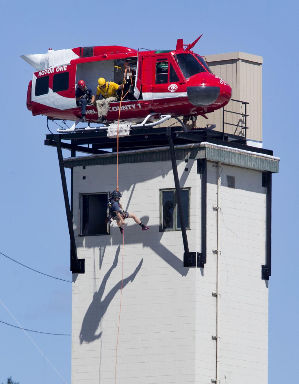 Hanging out | First responders practice hoist rescues | News ...
