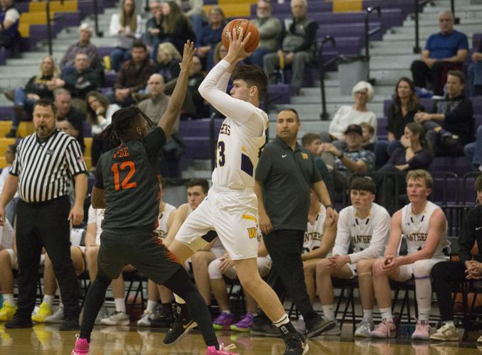 Photo Gallery: Wenatchee boys lose to AC Davis 84-27. | Sports ...