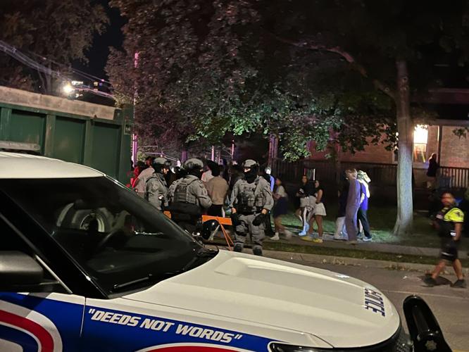 Police barricade major party streets at night amid large HOCO crowds ...