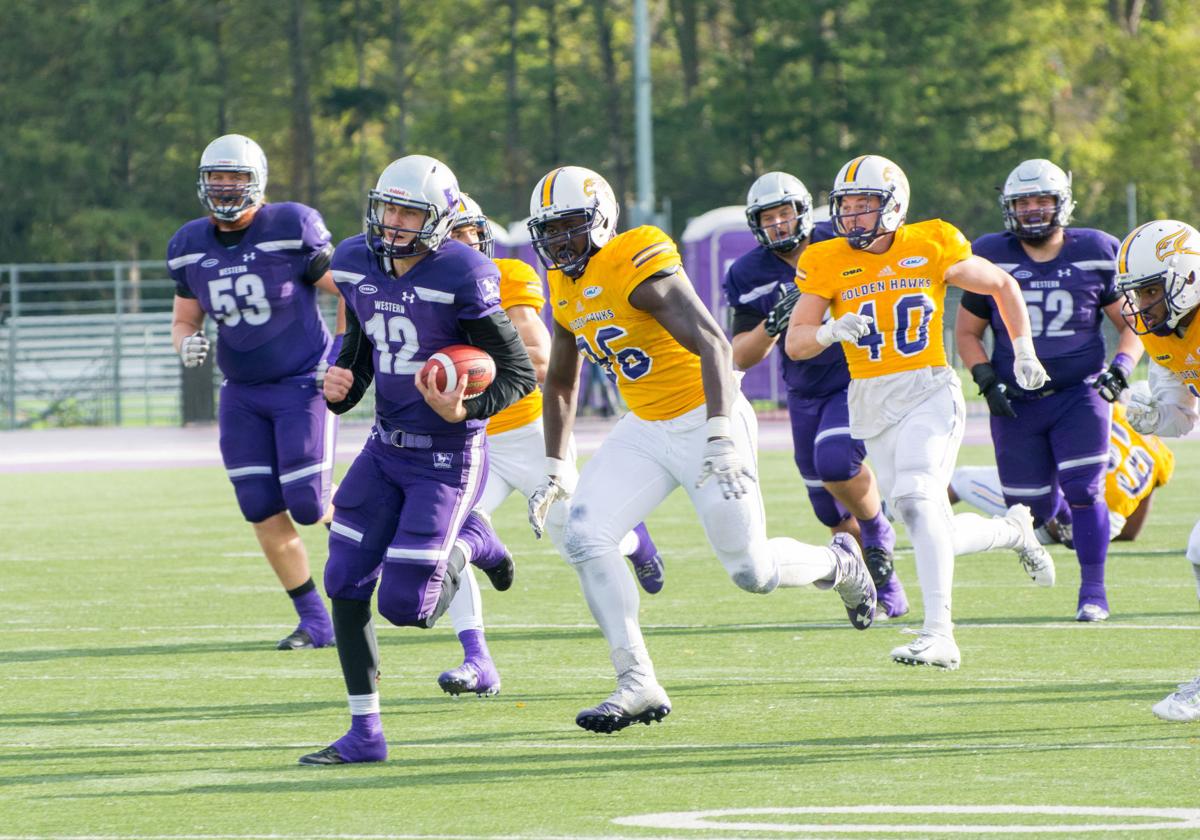 Gallery: Homecoming a hit, despite the rain | Culture | westerngazette.ca