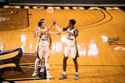 WMU men's basketball opens conference play with a win over Central ...