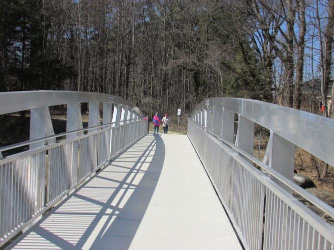 Pedestrian bridge completes path around Clague Park duck pond | West ...