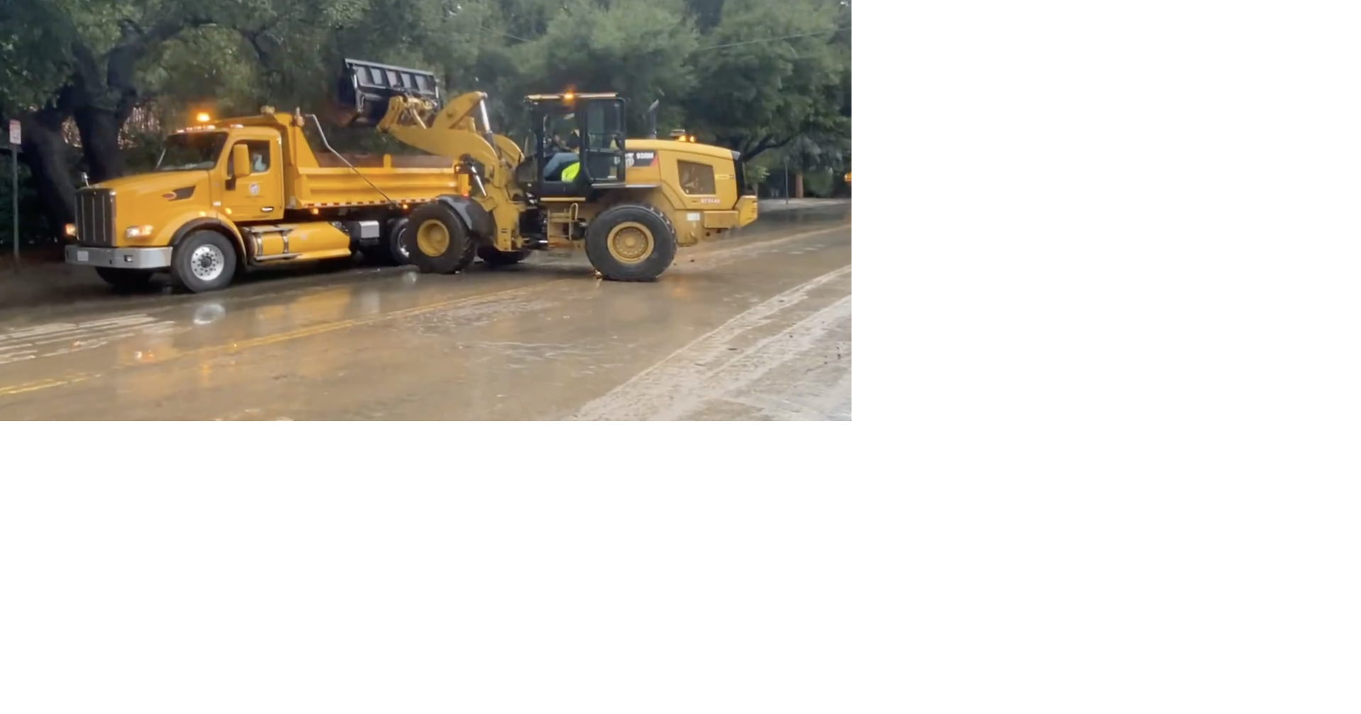 truck road debris flood streets | | westsidecurrent.com