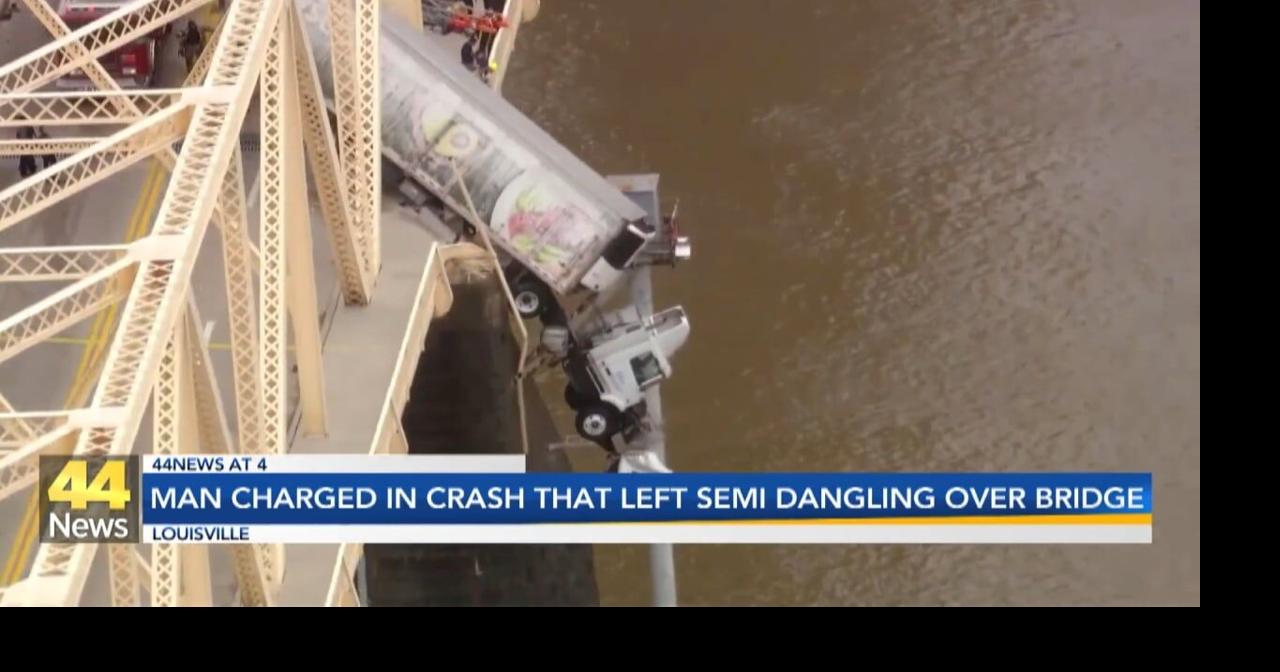 Man charged in Kentucky crash that left semi dangling over side of ...