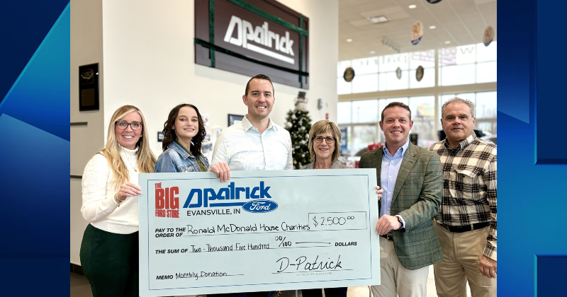 D-Patrick Ford/Lincoln presents a check to the Ronald McDonald House ...