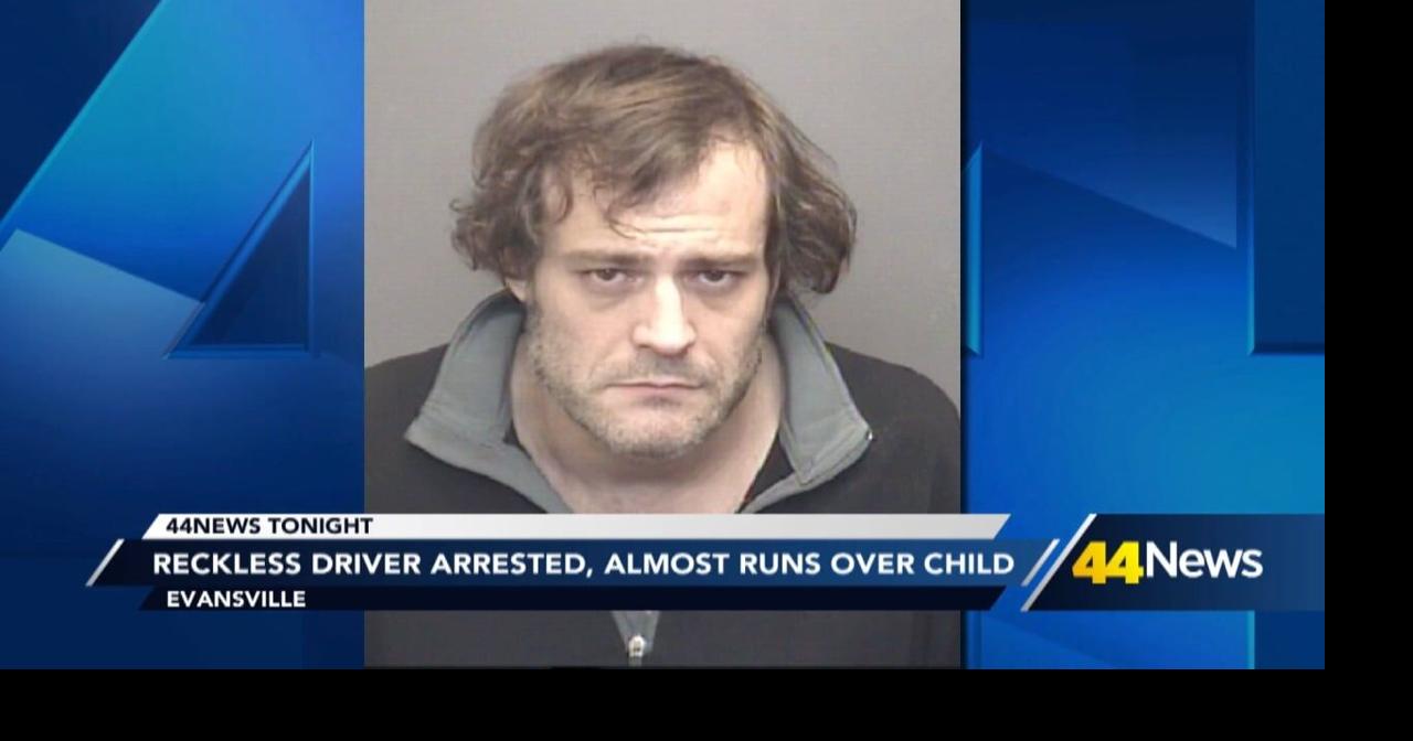 Reckless driver arrested after nearly running over child playing ...