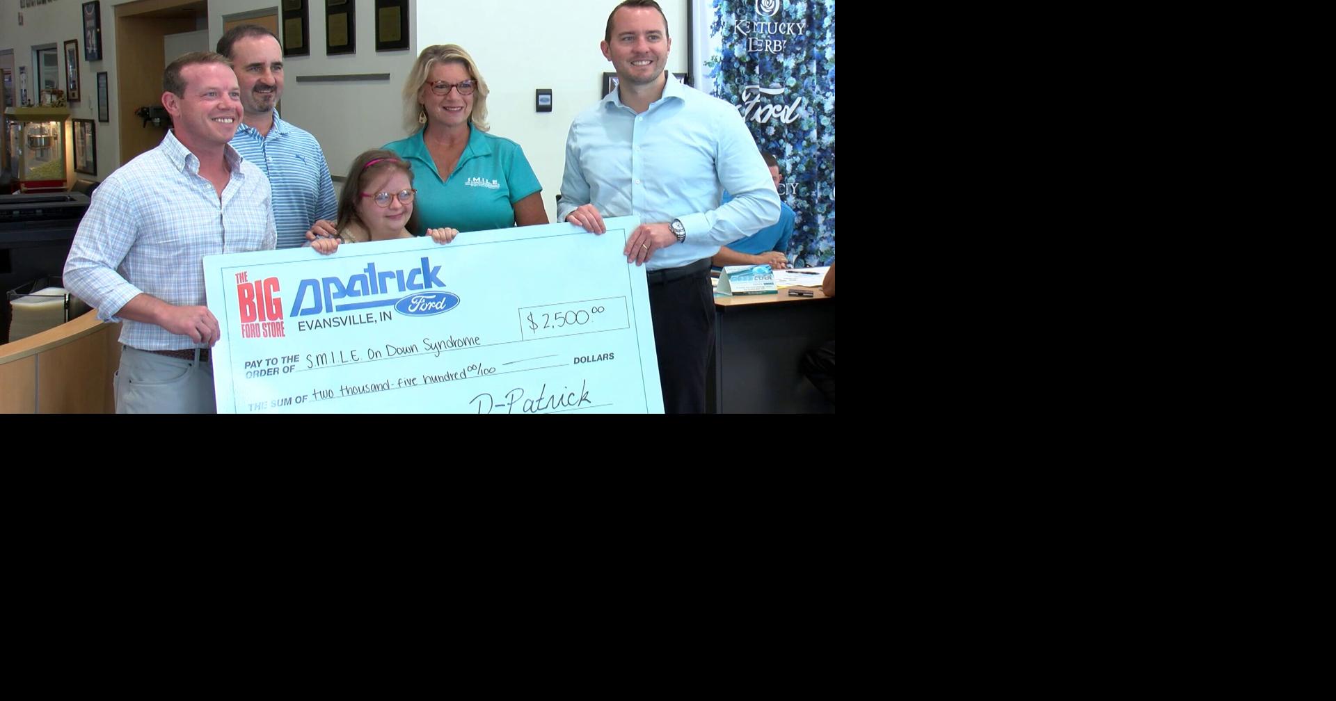 D-Patrick Ford Lincoln presents check for $2,500 to 'SMILE on Down ...