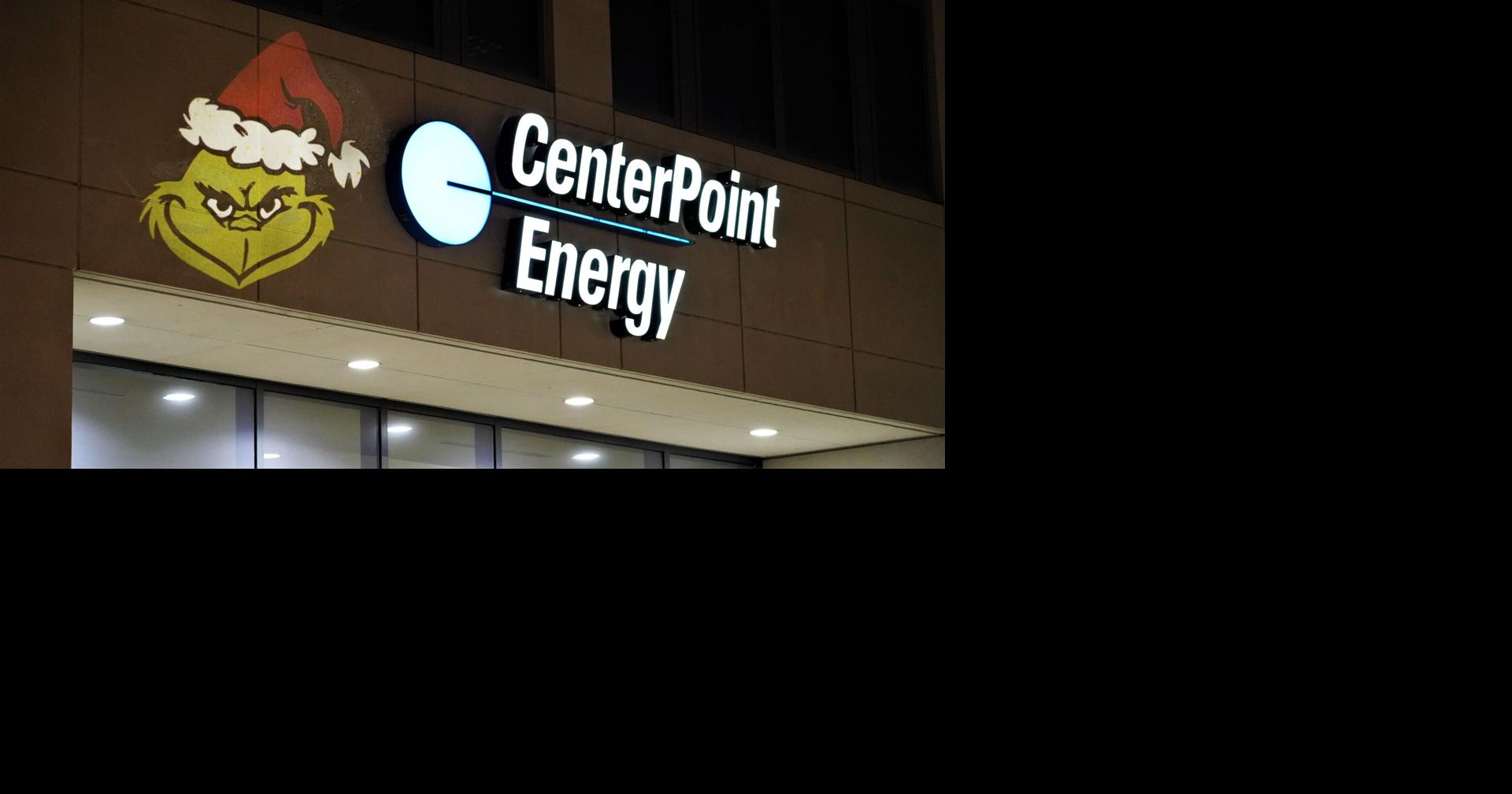 Group uses projector to shine "The Grinch" on CenterPoint Energy ...