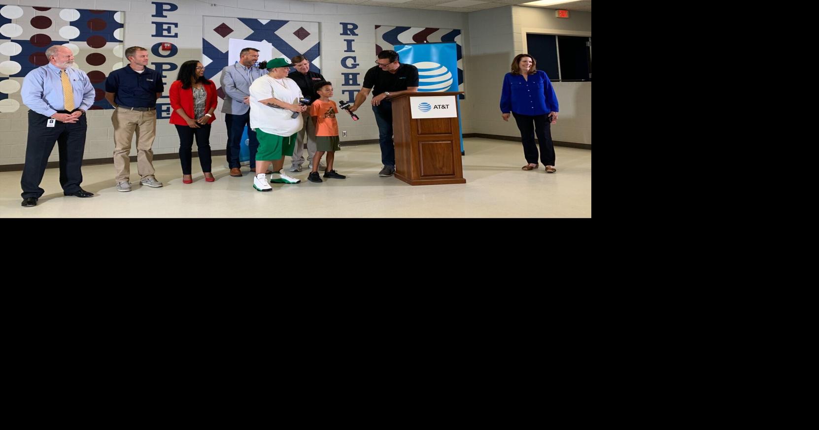 Some EVSC Students getting free laptops to help solve the 'Digital ...