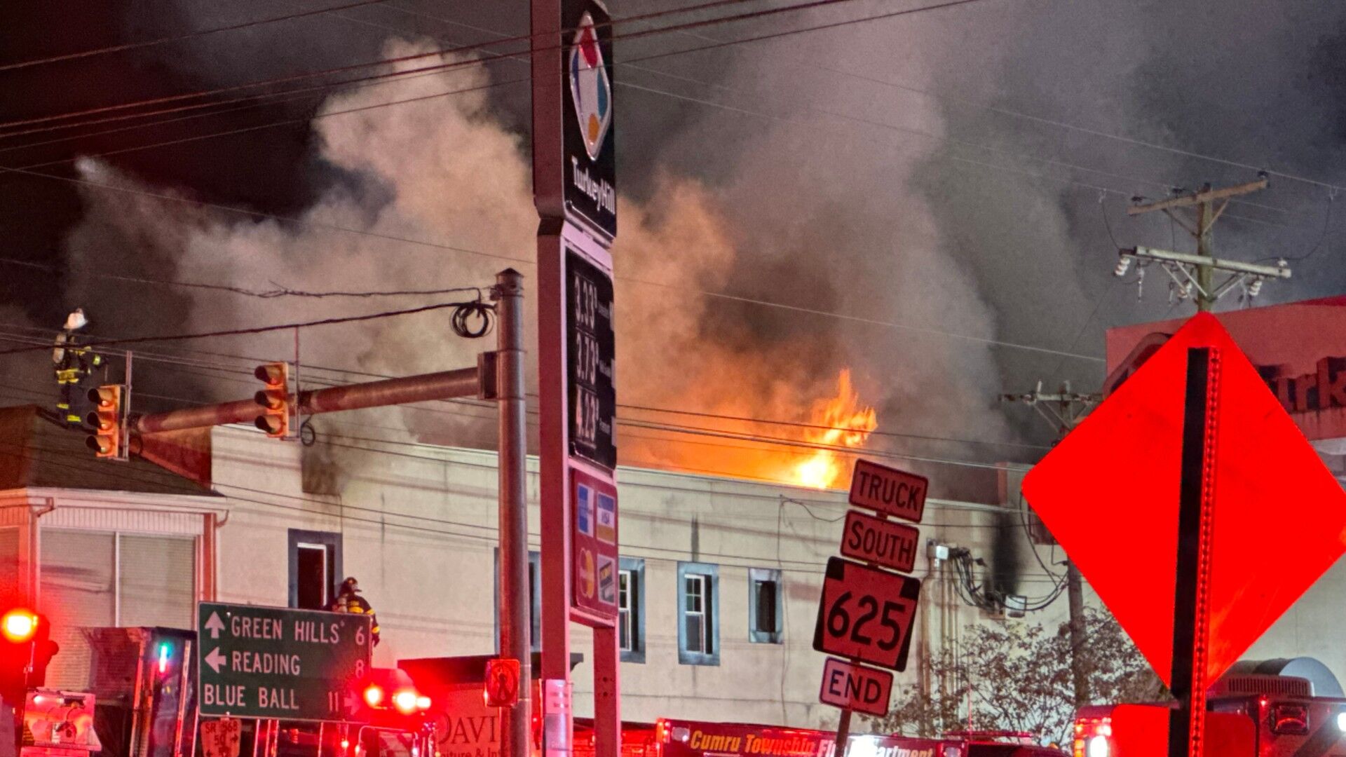 Crews battle fire at former furniture store building in Berks County ...