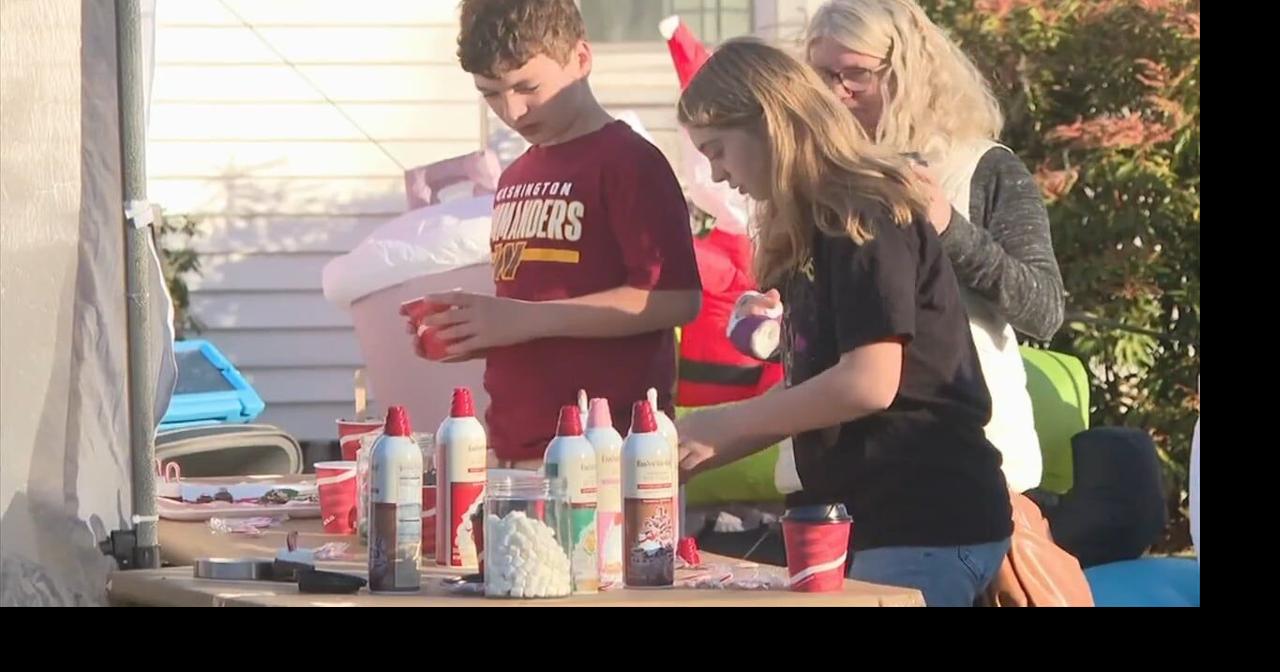 A young boy has put a special twist on the classic lemonade stand ...