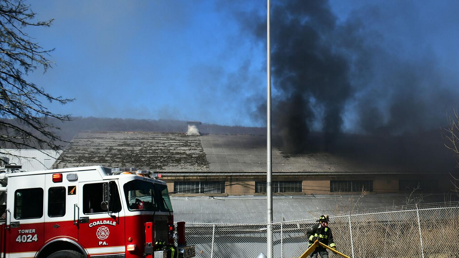 Crews battle flames at Lansford borough garage after street sweeper ...