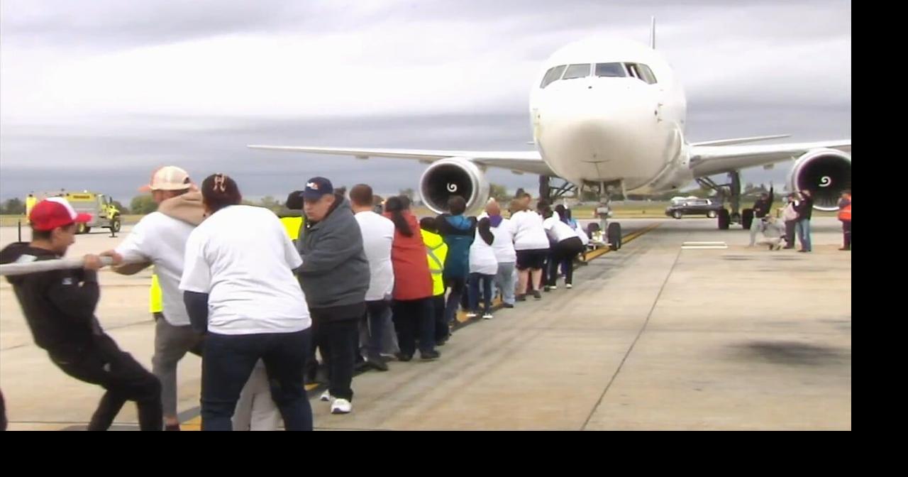 Over 400 participants pull 175,000-pound cargo plane for Greater Lehigh ...