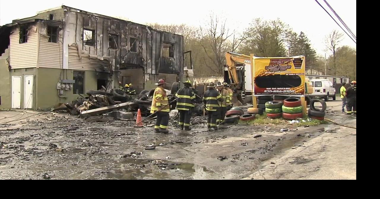 A dozen departments from three counties battle fire at tire shop ...