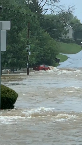 PHOTOS and VIDEOS: Isaias brings torrential downpours to region ...