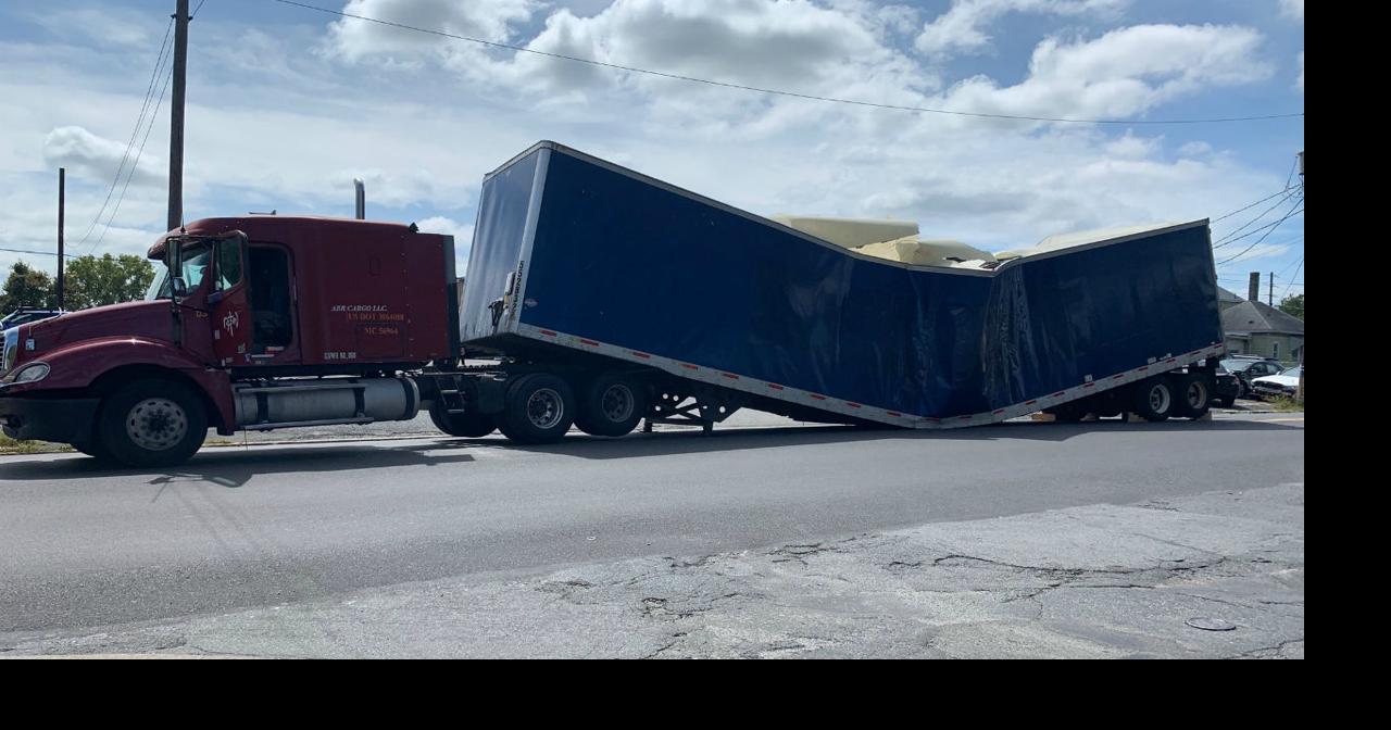 Road reopens after tractor-trailer apparently collapses on itself ...