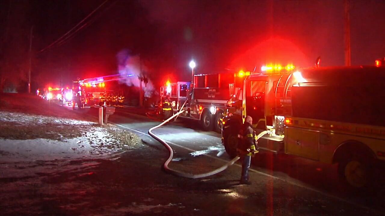 Winds, cold temps pose challenges for fire crews as they battle house ...