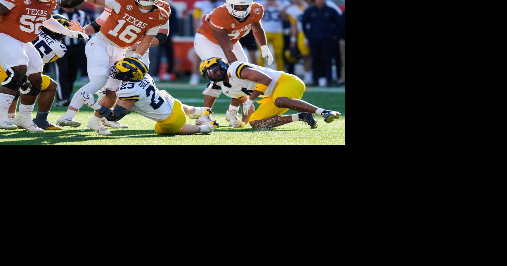 Manning uses arm and legs to lead No. 14 Texas to a 41-27 Citrus Bowl ...