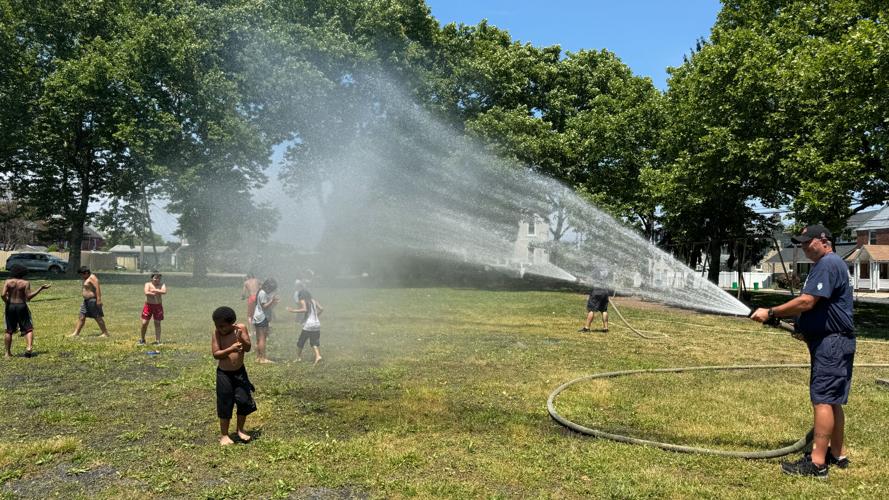Firefighters, police officers in Allentown help kids cool off, connect ...