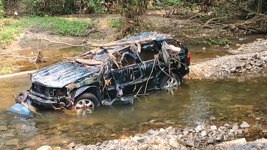 Debris, floodwaters knock out bridge to Exeter Twp. family's home ...