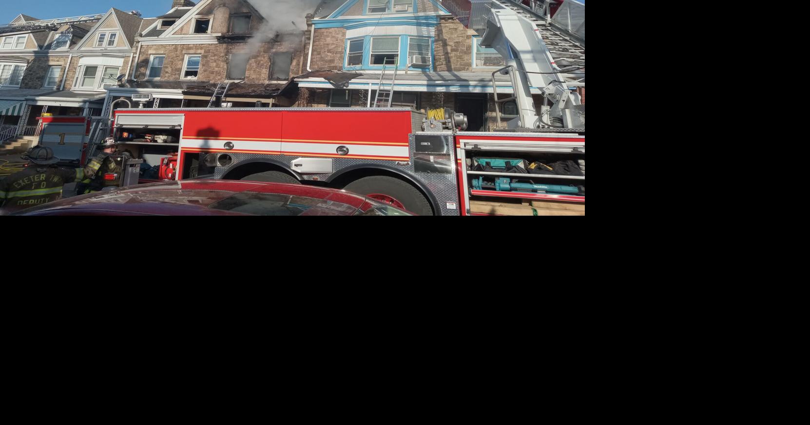Firefighters battle 3-alarm fire at row house on Spruce St. in Reading ...