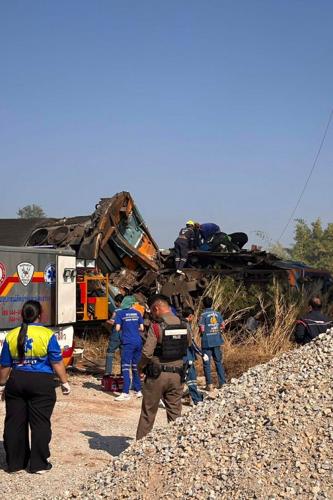 A construction crane falls onto a moving train in Thailand, killing at ...