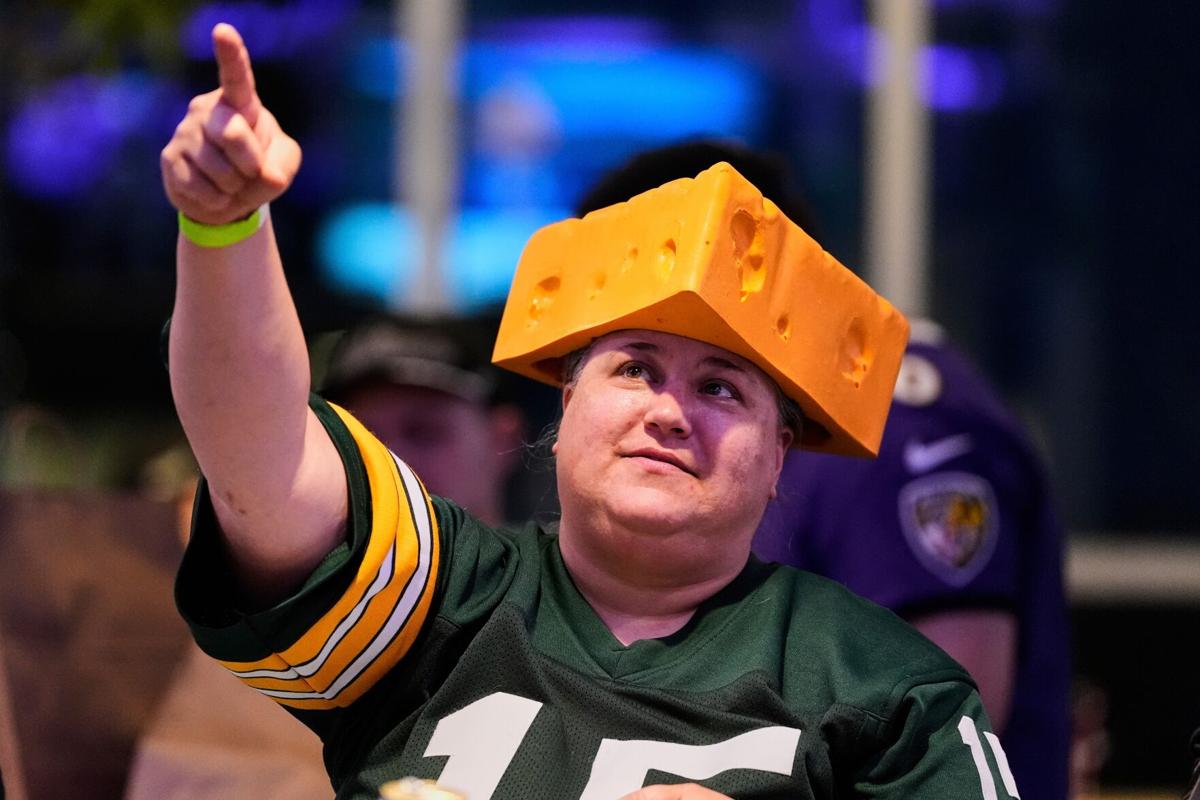The cheesehead hat is a sunny nod to America's 'Hold my beer ...